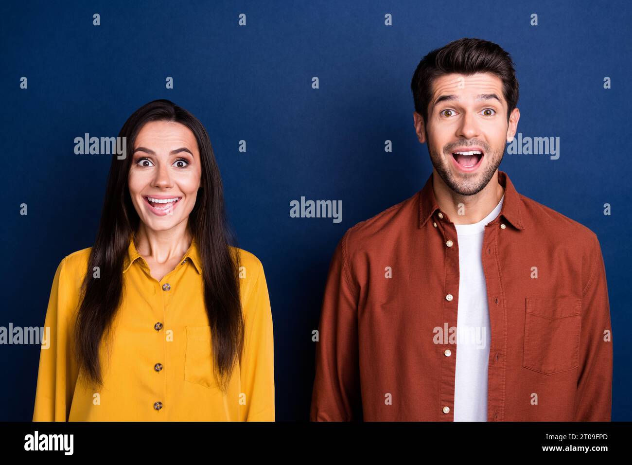 Photo of two astonished positive people unexpected news open mouth ...