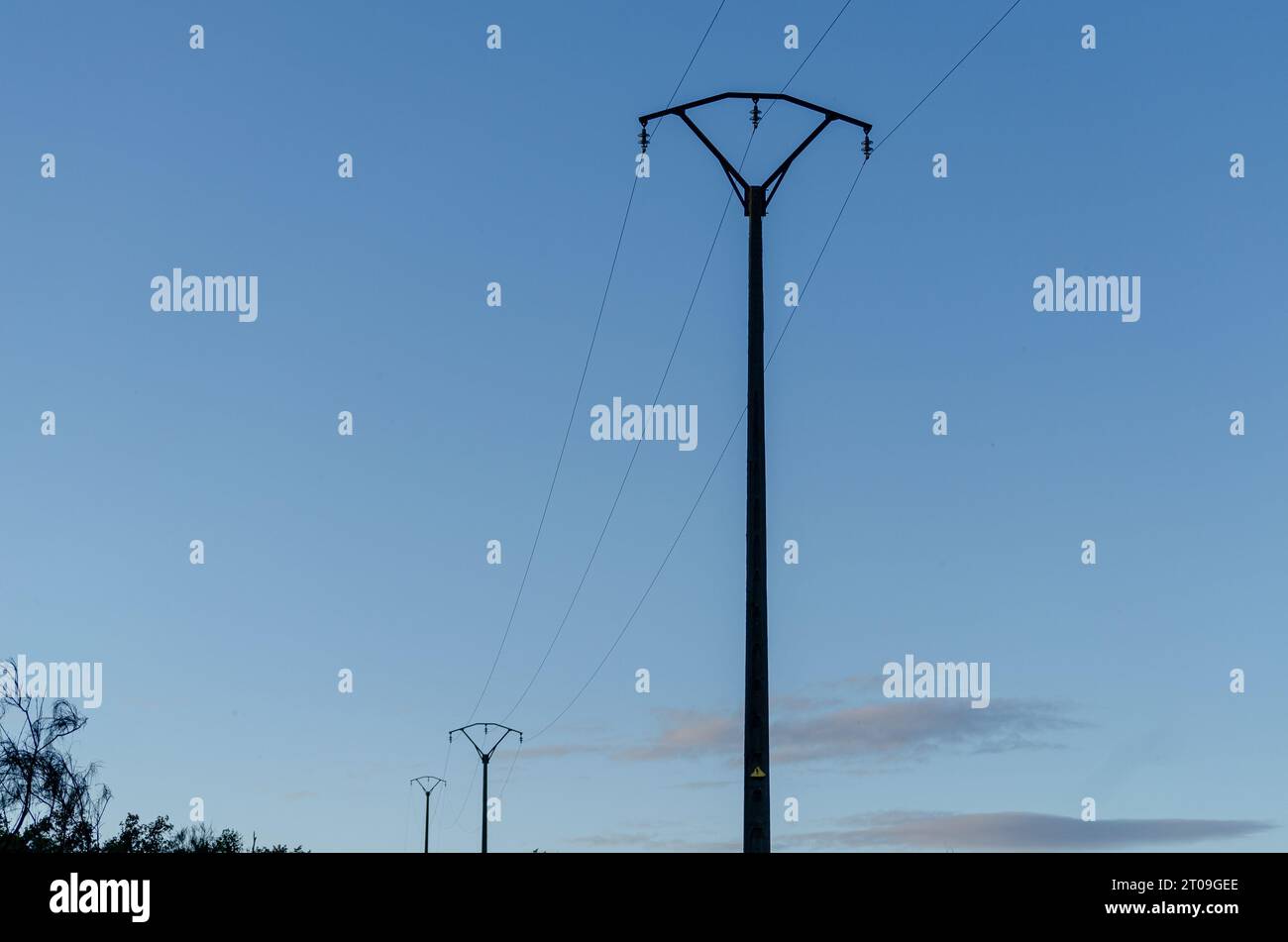 silhouette of power line poles Stock Photo - Alamy