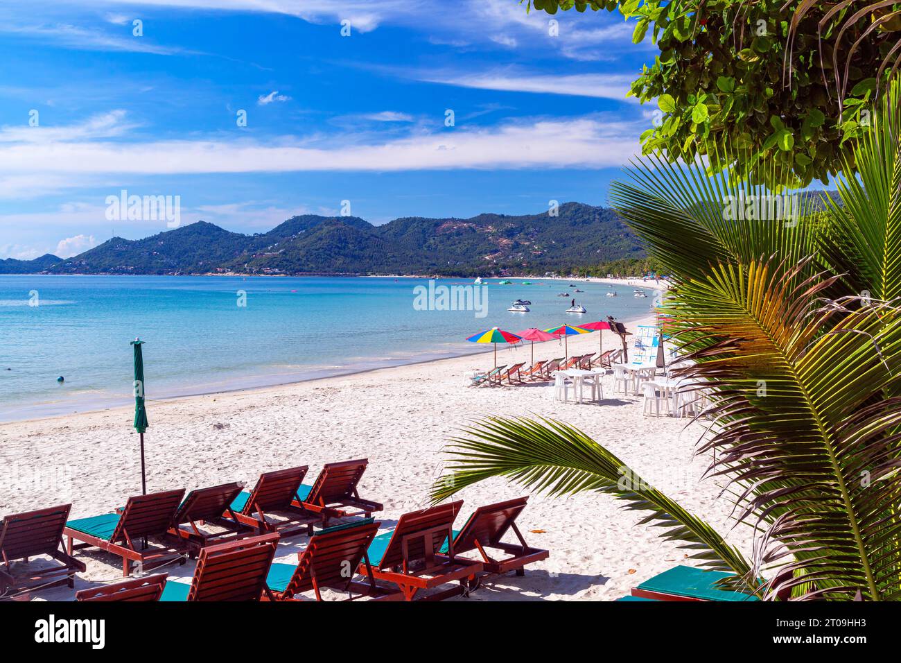 Sun loungers laid out in early morning landscape of sea and sand at ...