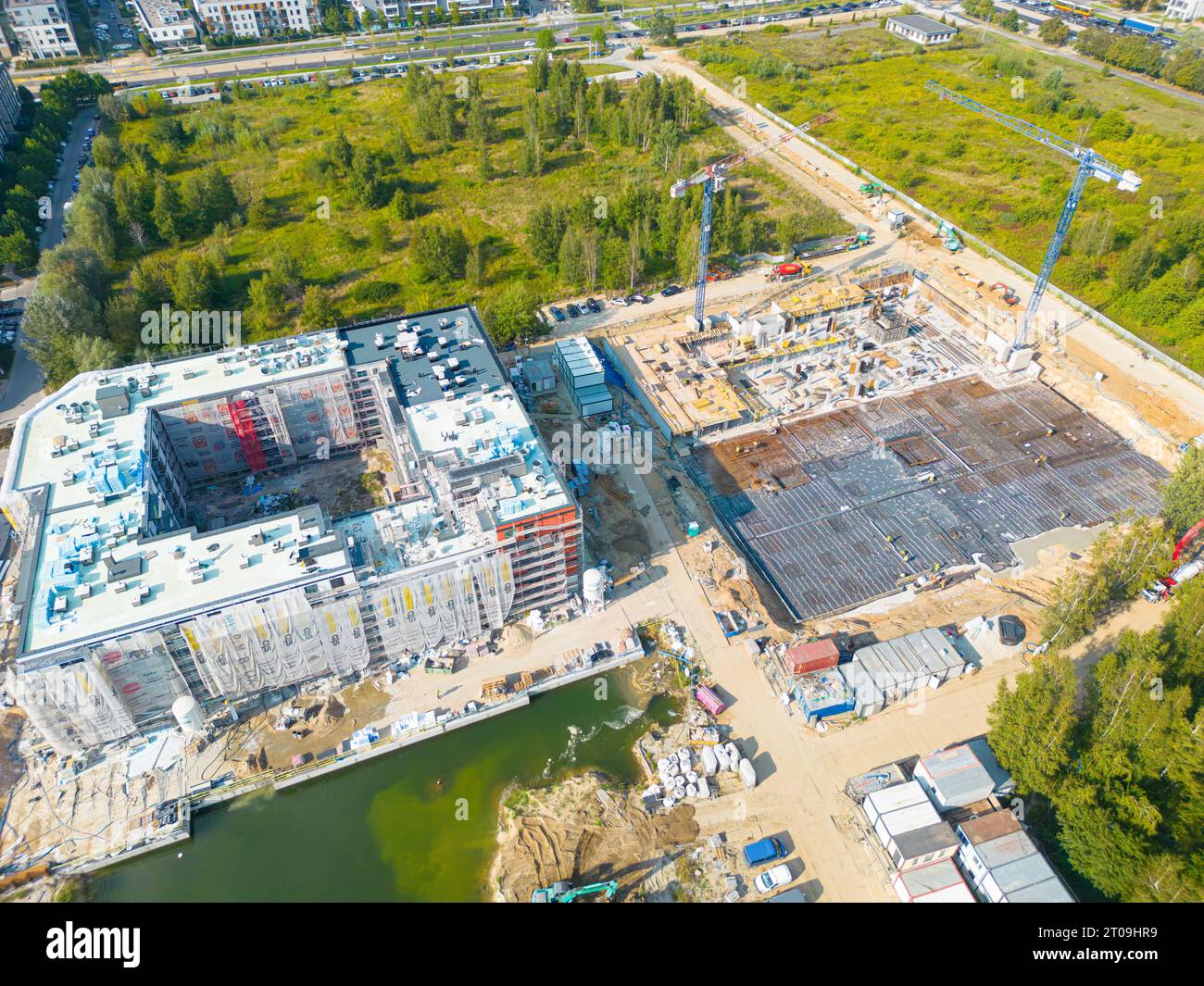 Aerial Bird Eye View Of a Construction Site Building Cranes Looking ...
