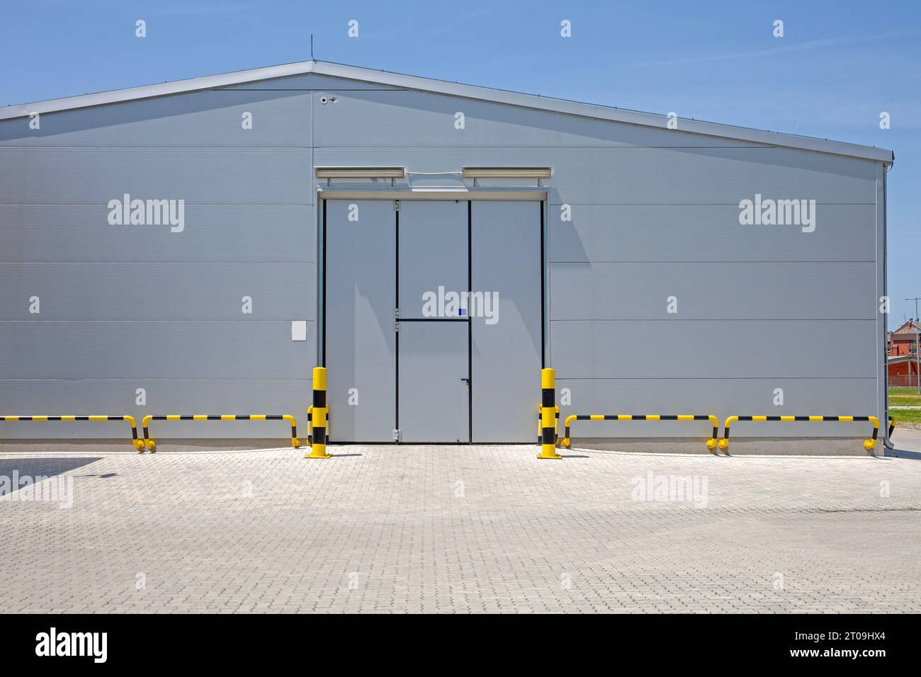 Distribution Warehouse Building Exterior With Cargo Door Stock Photo ...