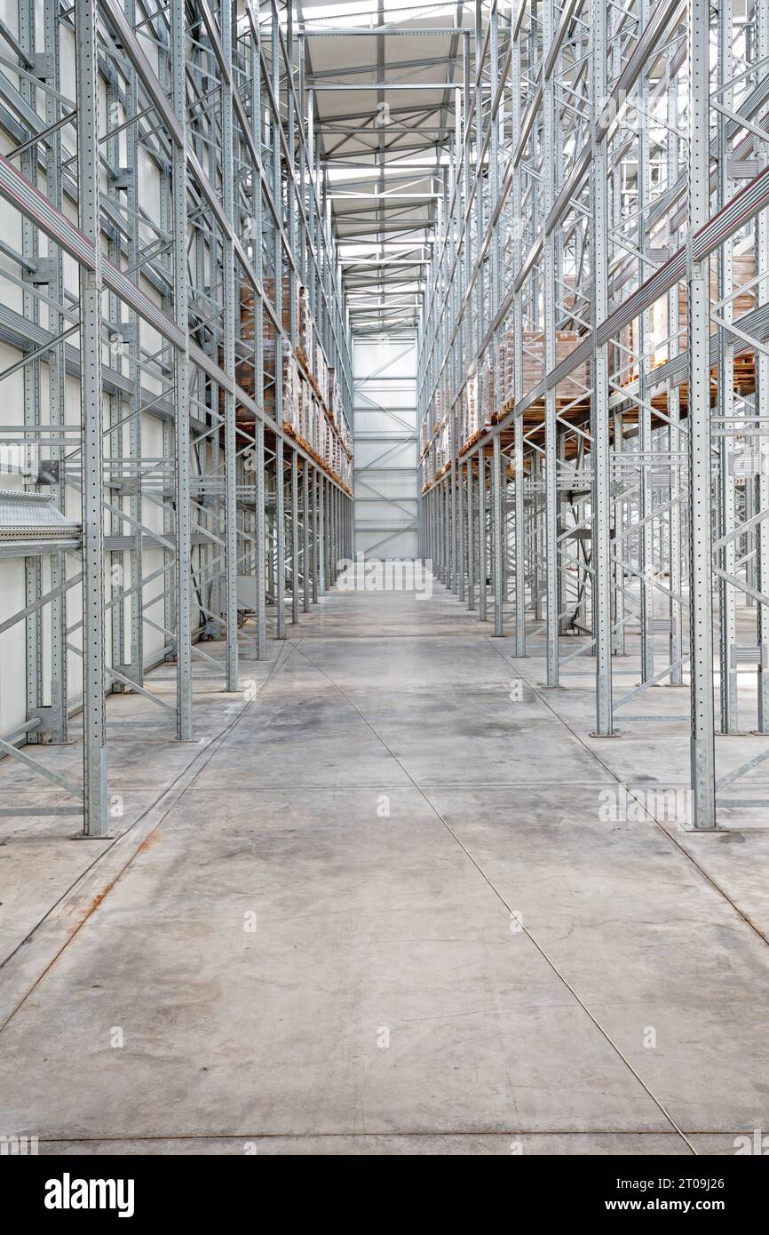 Empty Shelves in New Distribution Warehouse Stock Photo - Alamy