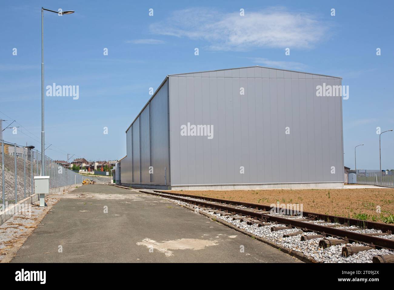 Distribution Warehouse Building Exterior With Rail Road Tracks Stock ...