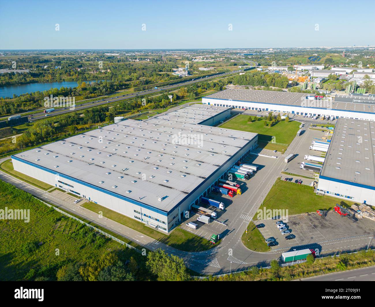 Aerial view of the logistics park with warehouse, loading hub and many ...