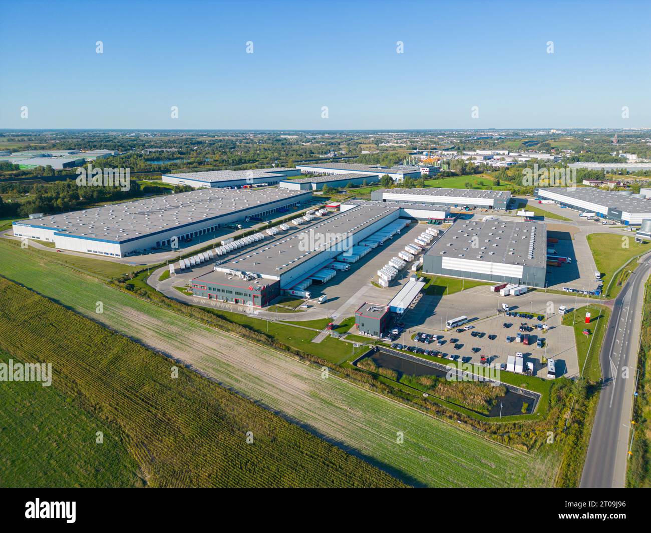 Aerial view of the logistics park with warehouse, loading hub and many ...