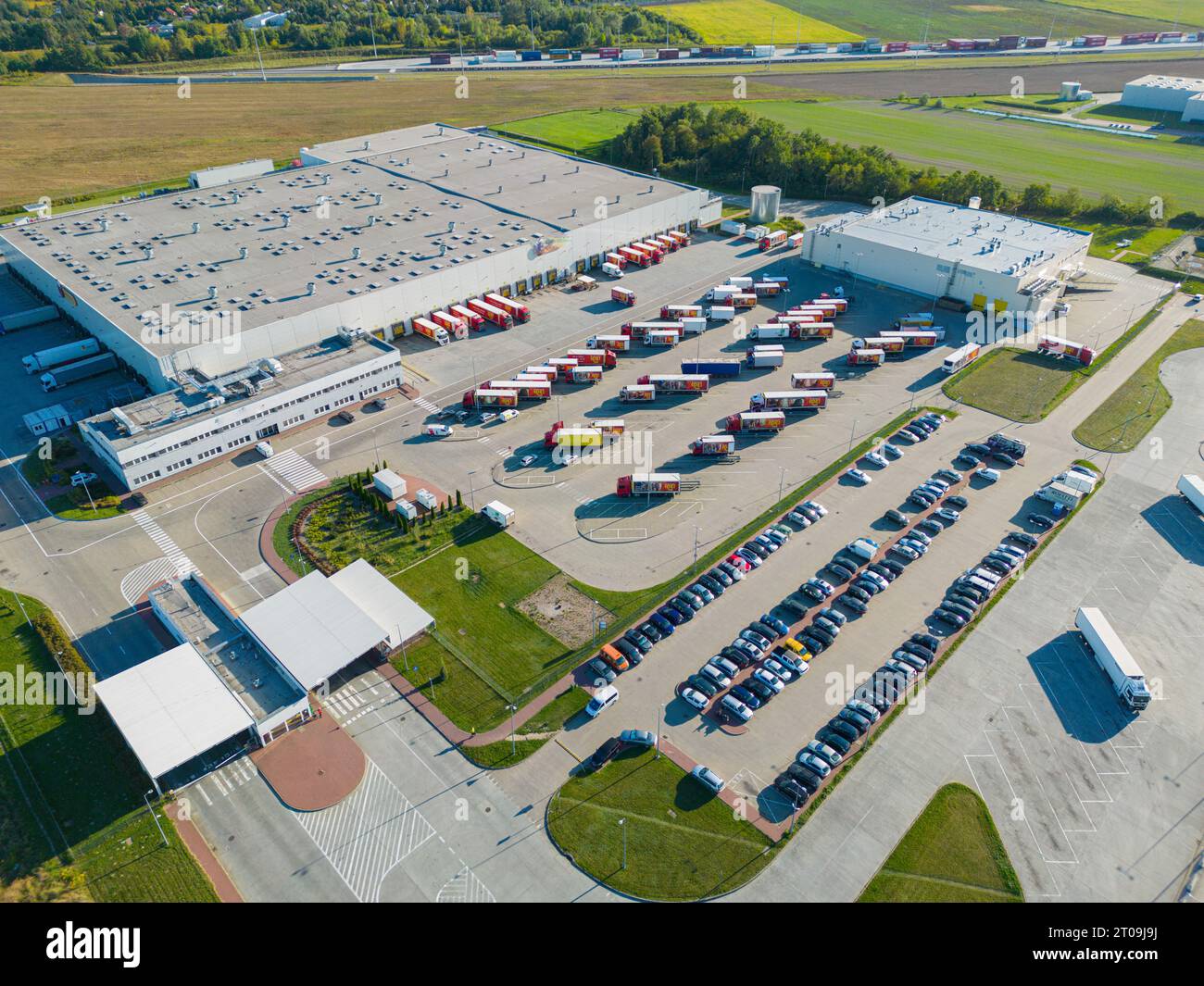 Aerial view of the logistics park with warehouse, loading hub and many ...