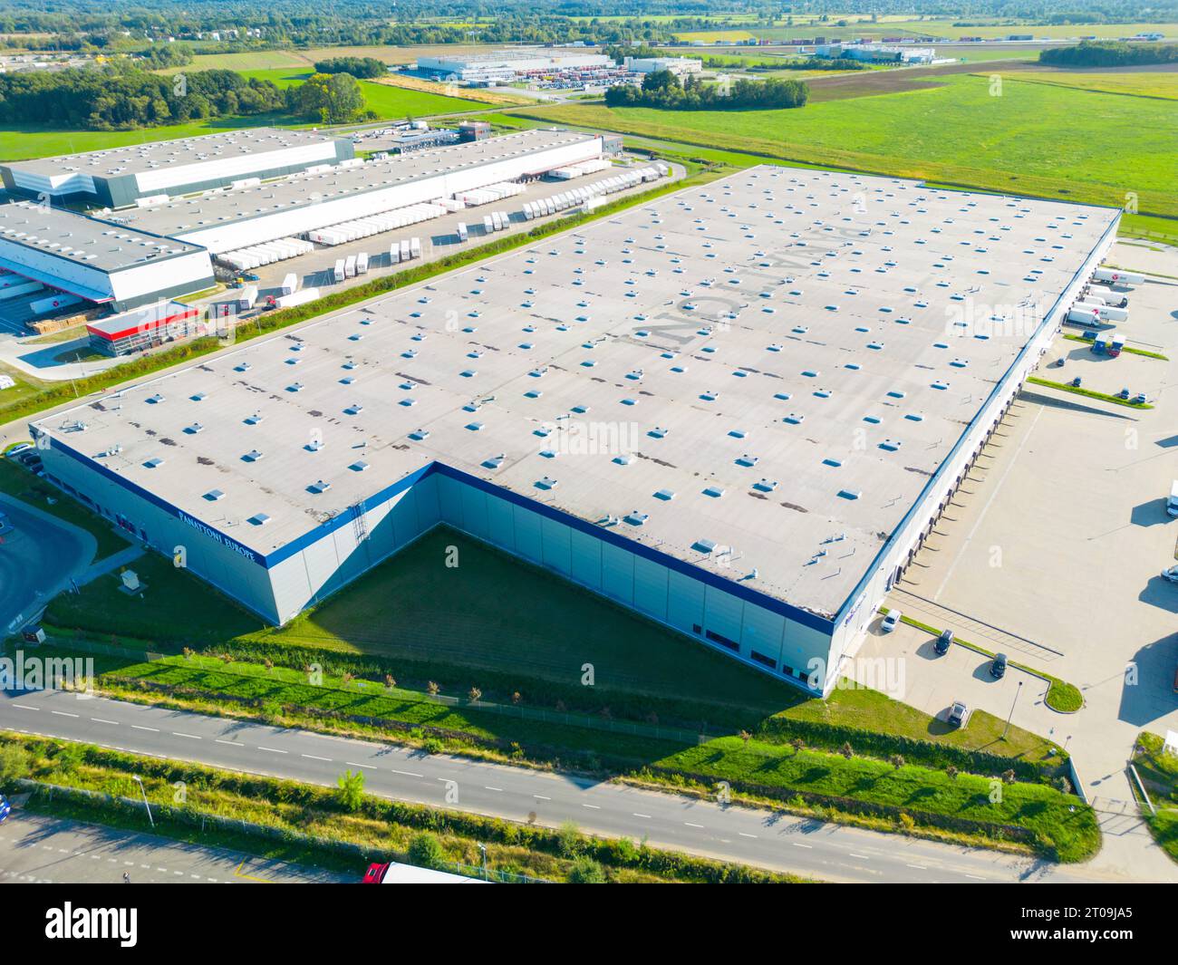 Aerial view of the logistics park with warehouse, loading hub and many ...