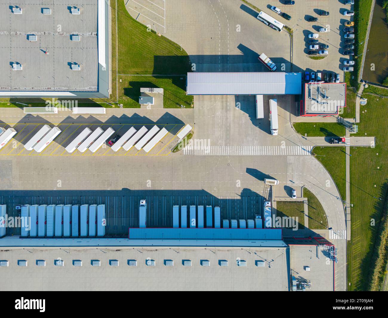 Aerial view of the logistics park with warehouse, loading hub and many ...