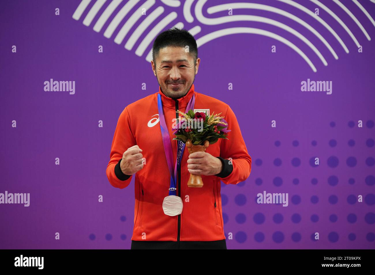 Silver medallist Japan's Shudai Harada celebrates during the medal ...