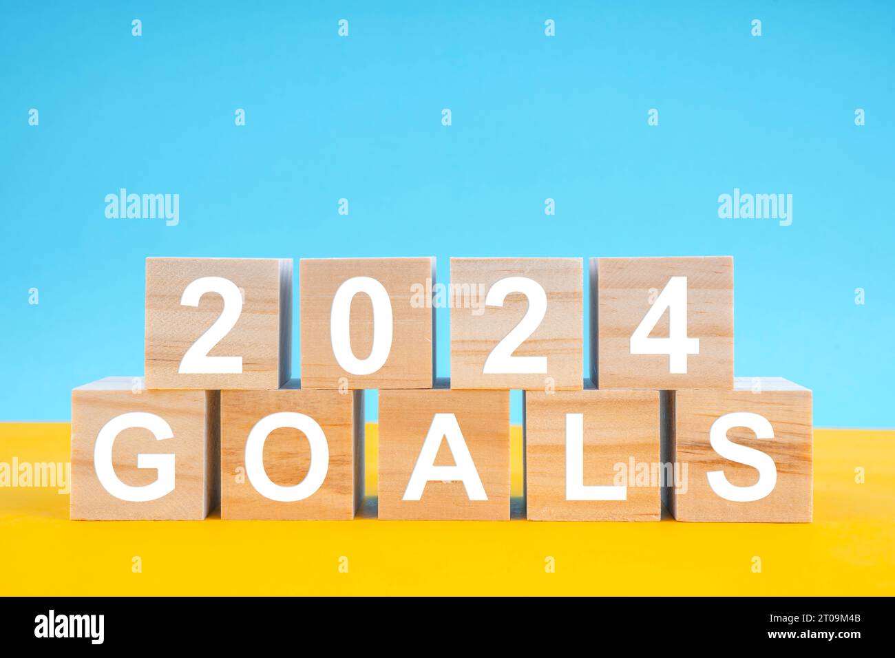 Wooden cubes 2024 GOALS on yellow and blue background. Planning and ...