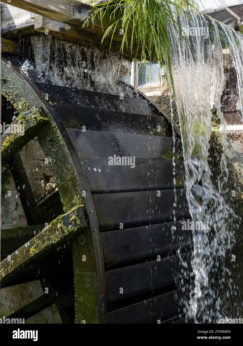 Close-up of a water-driven mill wheel of a watermill. Wilhelm Busch ...