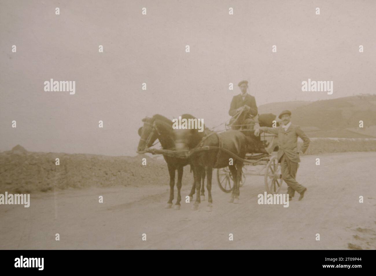 old photograph of the early 1900s, horse carriage, photograph turned to ...