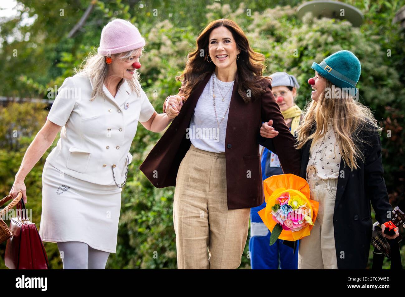 Crown Princess Mary is received on a miniature red carpet by the ...