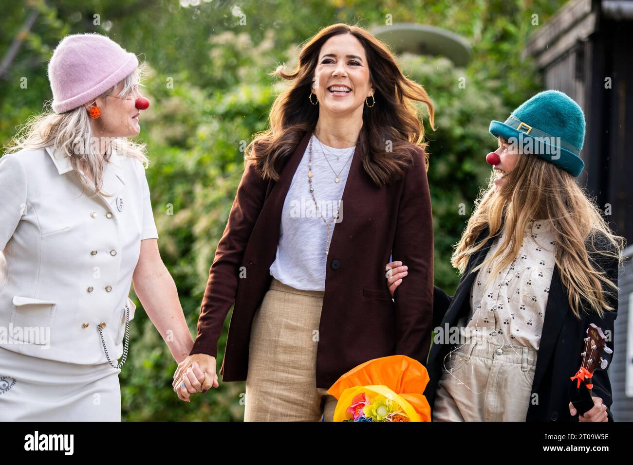 Crown Princess Mary is received on a miniature red carpet by the ...