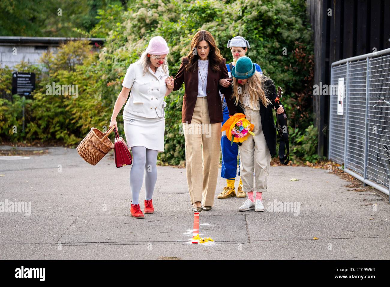 Crown Princess Mary is received on a miniature red carpet by the ...