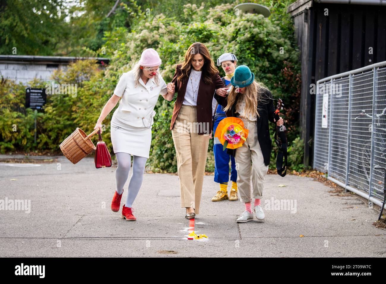Crown Princess Mary is received on a miniature red carpet by the ...