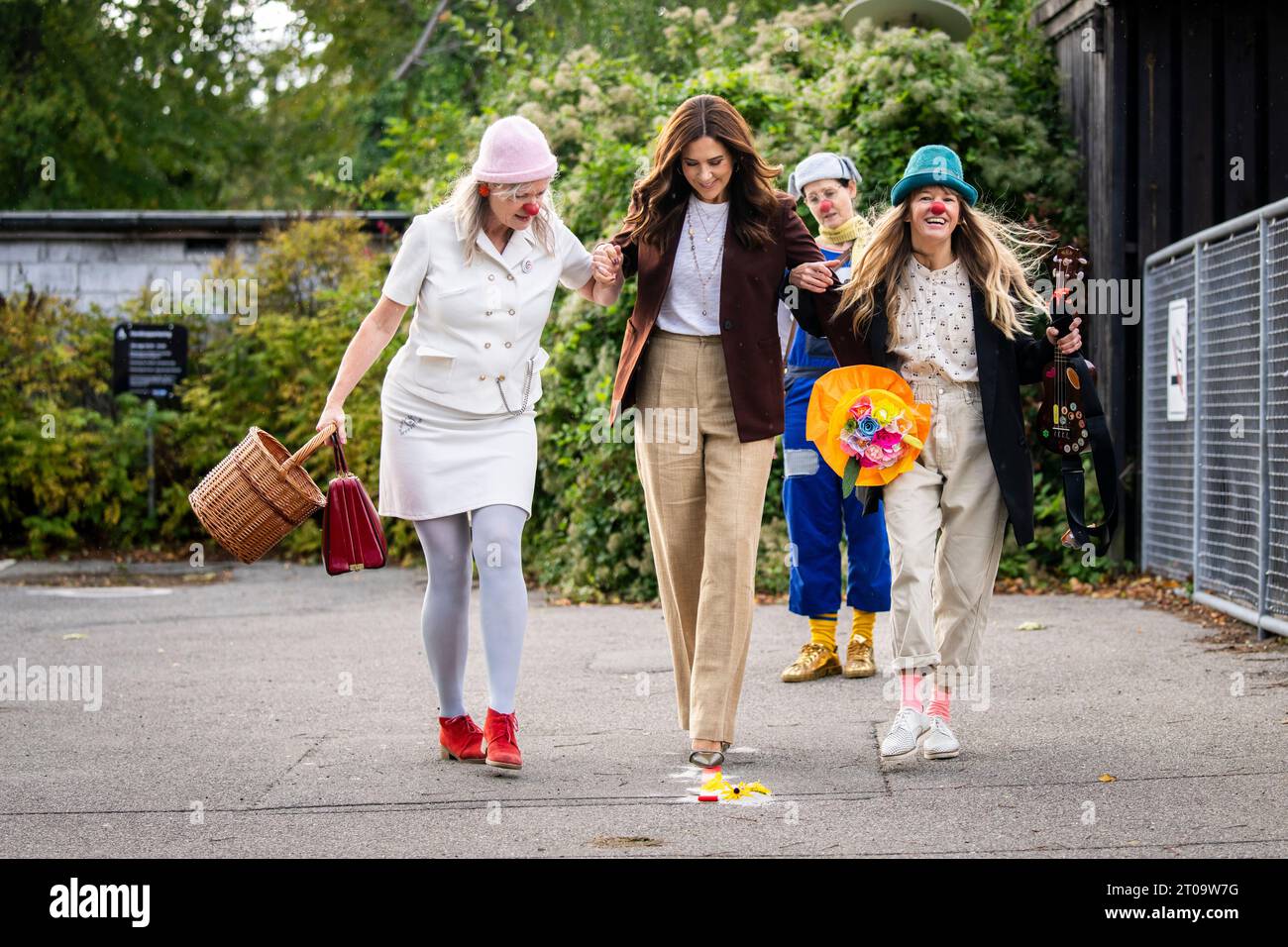 Crown Princess Mary is received on a miniature red carpet by the ...