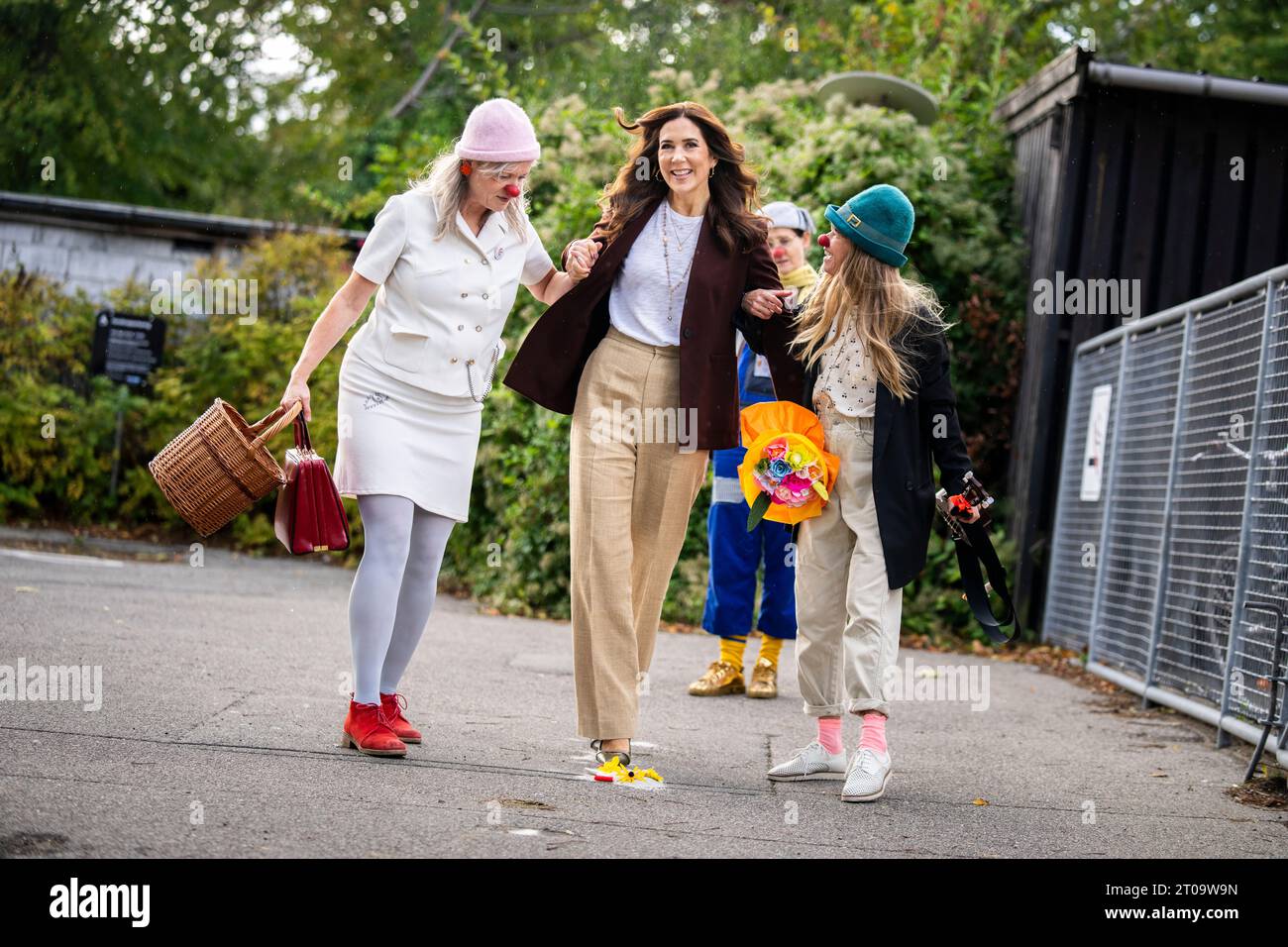 Crown Princess Mary is received on a miniature red carpet by the ...