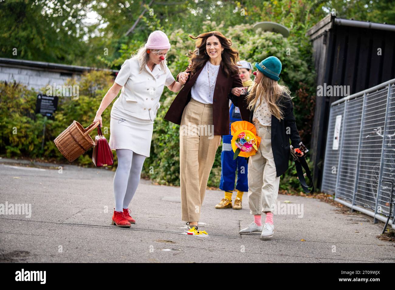 Denmark's Crown Princess Mary is welcomed by the hospital clowns Basta ...
