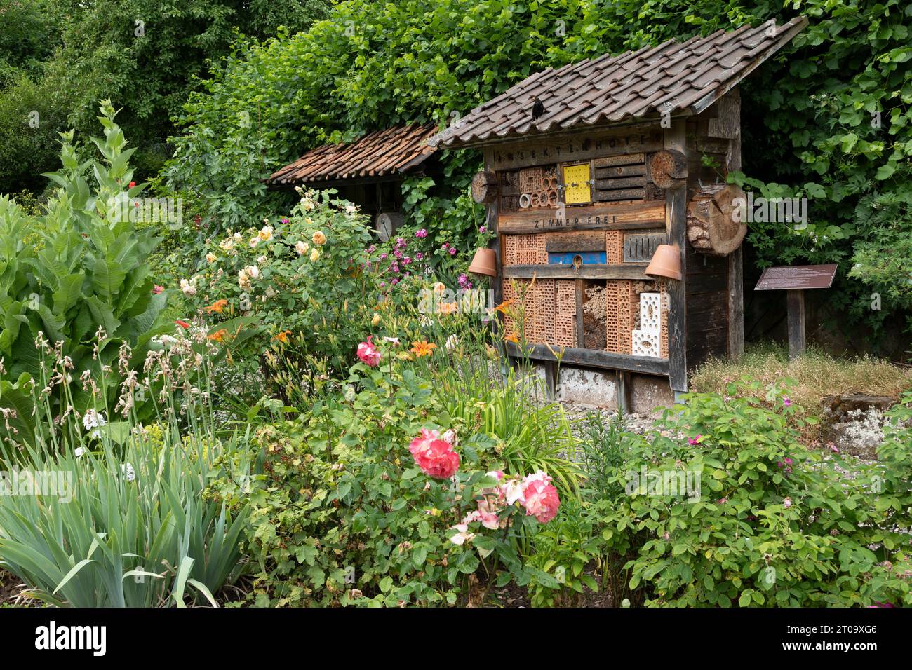 large insect hotel, free standing in the garden Stock Photo - Alamy