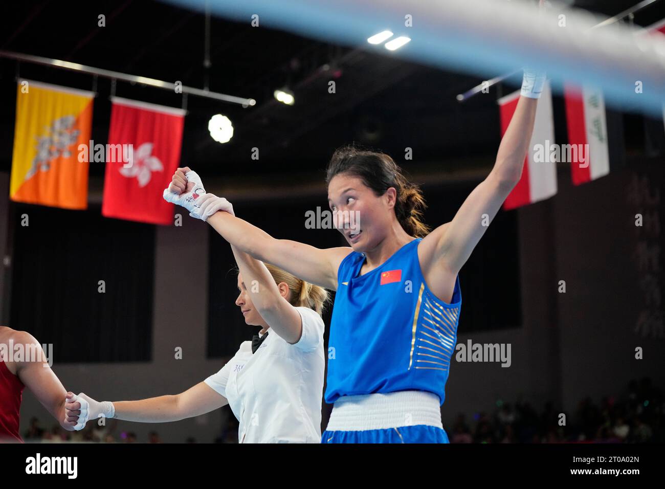 China's Yang Liu celebrates her victory over Thailand's Janjaem ...