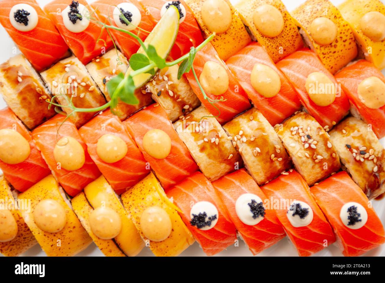 Assorted sushi big set close-up background. A variety of Japanese sushi ...