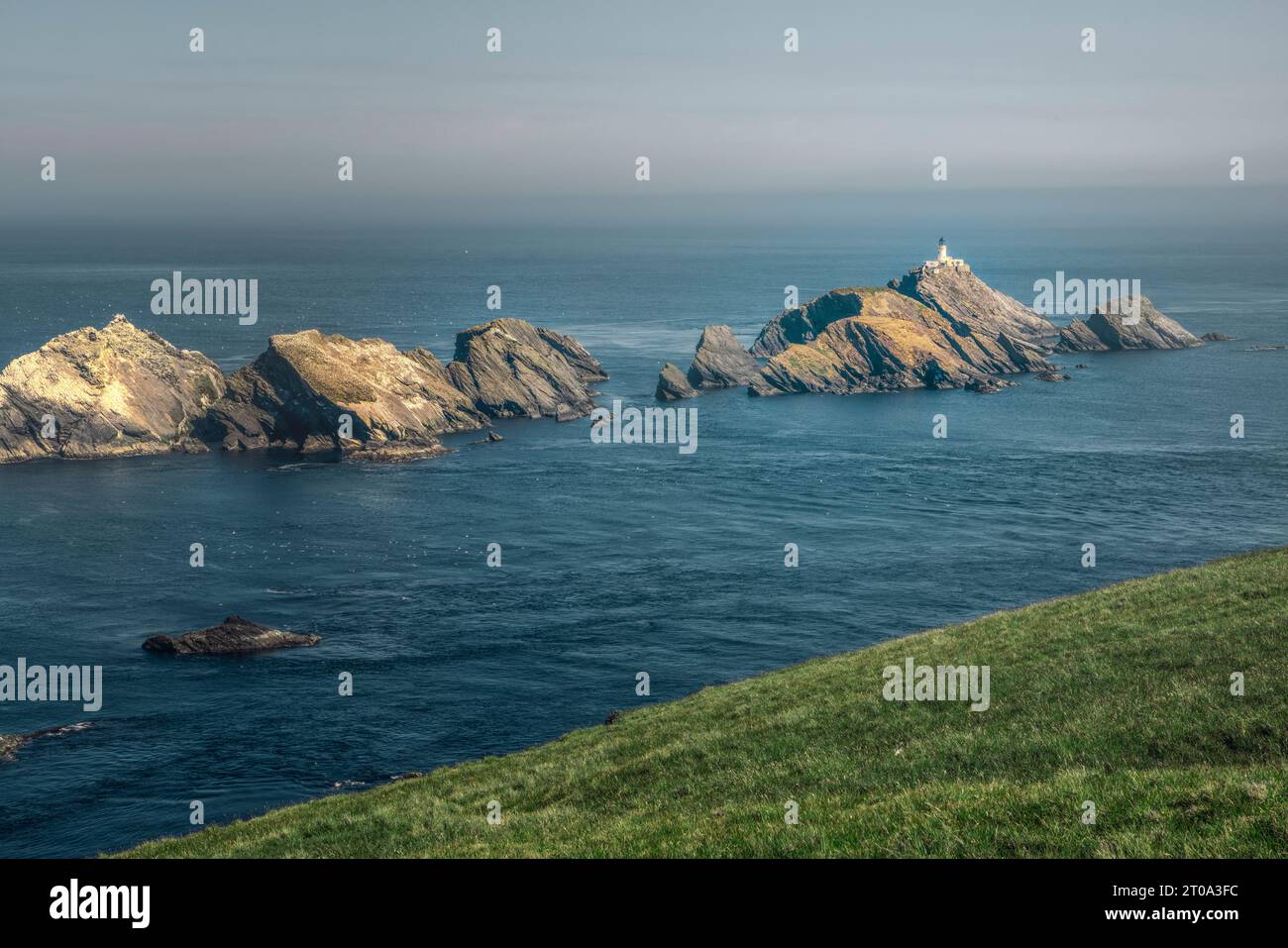 The dramatic coastline of Hermaness on Unst, Shetlands with the Muckle ...