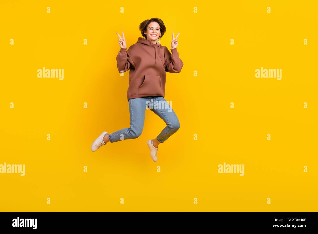 Full size photo of funky jumping crazy girl overjoyed show cool symbol ...