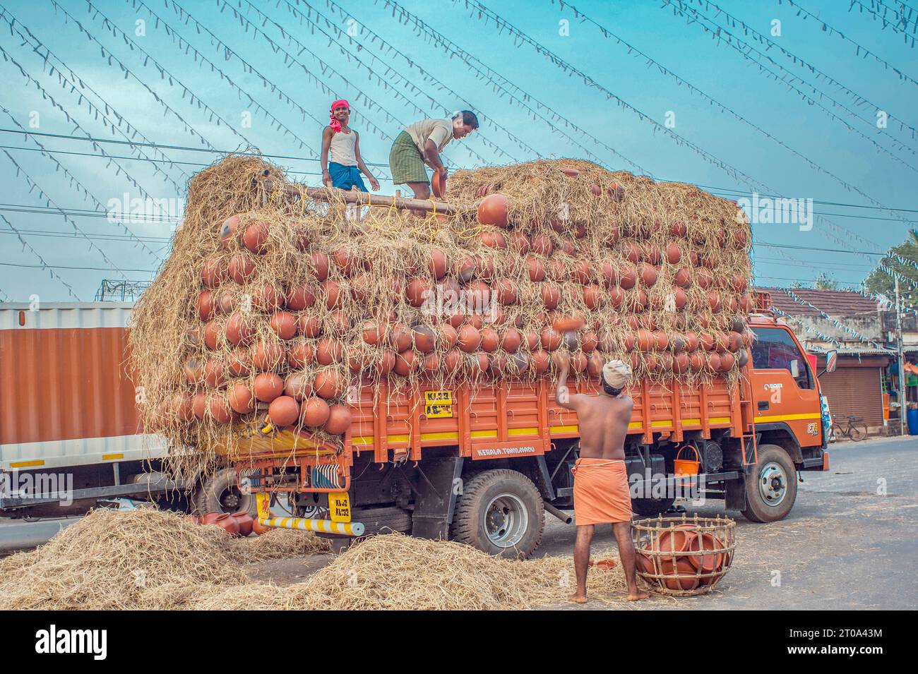 01 22 2013 Clay Pot Unloading From Truck-niar Changanacherry Boat Jetty ...
