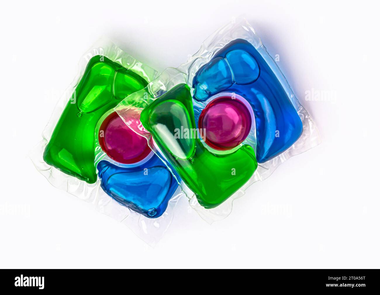 capsules with colored gel for washing on a white background. High ...