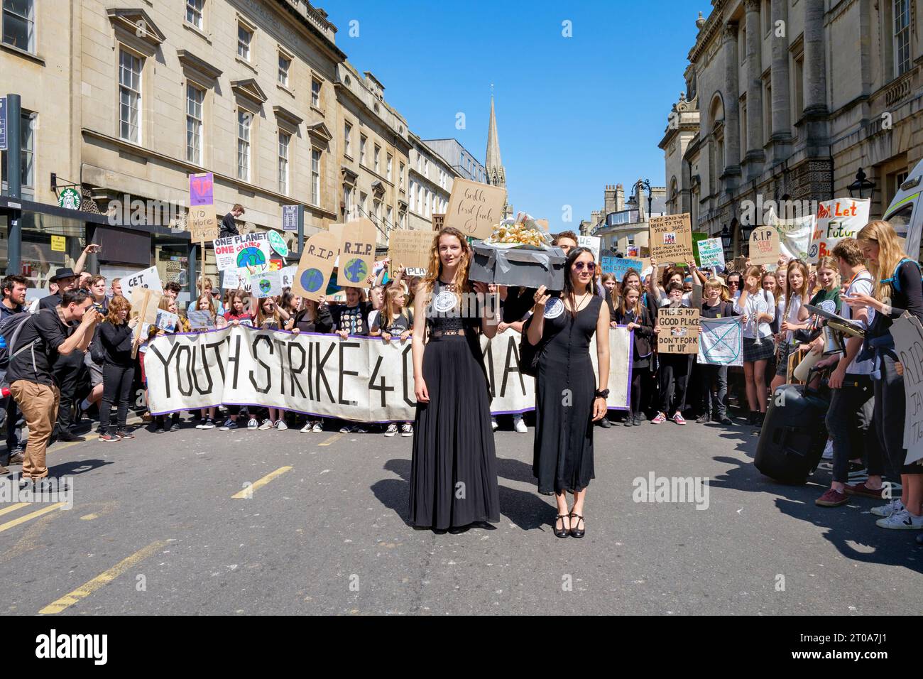 Bath college students and school kids carrying climate change placards ...