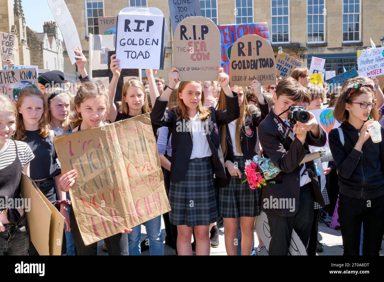 Bath college students and school kids carrying climate change placards ...