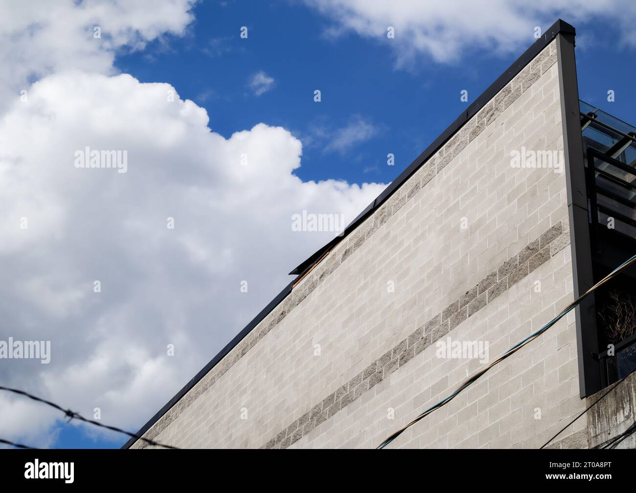 Roof metal flashing bent or blown-off from wind. Damage to the aluminum ...