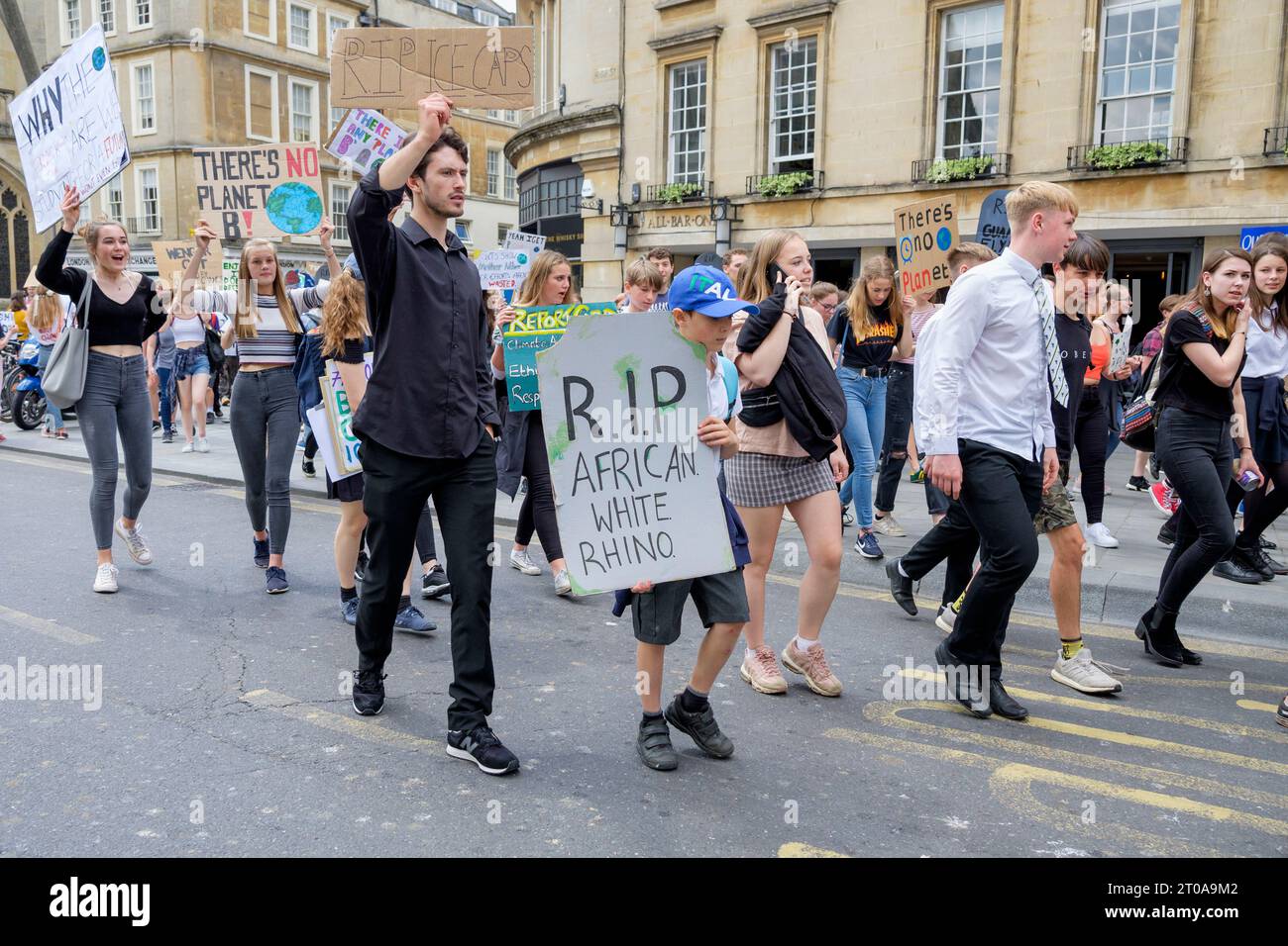 Bath college students and school kids carrying climate change placards ...