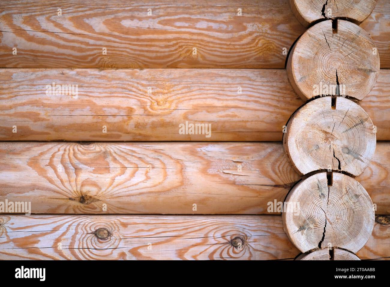 Natural background pattern of log wall. Construction of houses made of ...