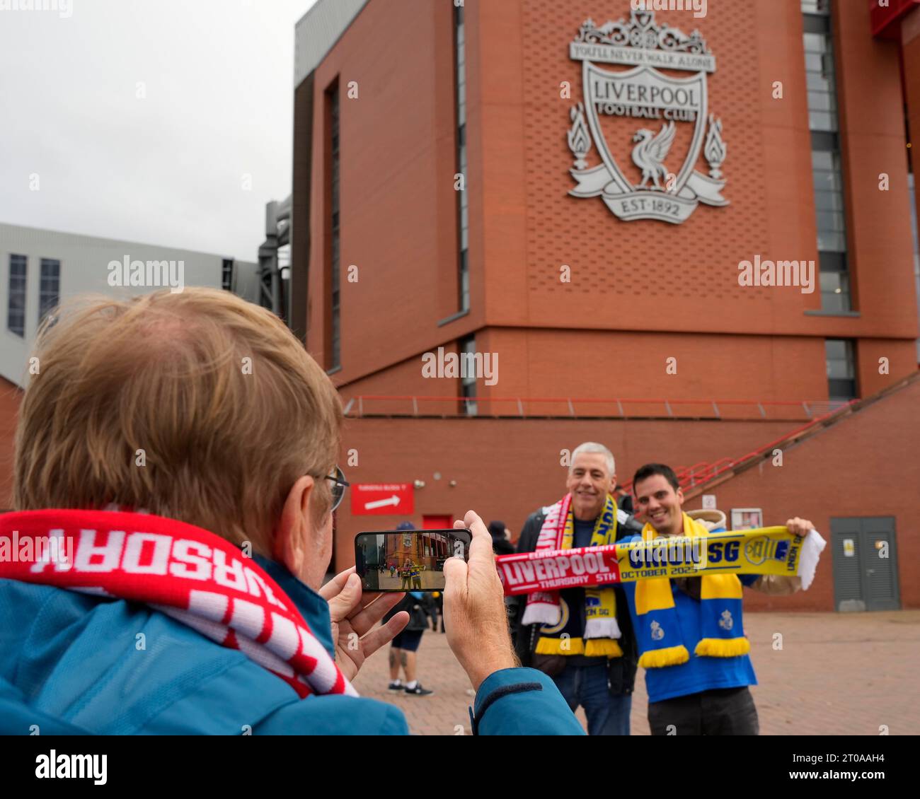 Liverpool, UK. 05th Oct, 2023. Union Saint-Gilloise fans pose for a ...