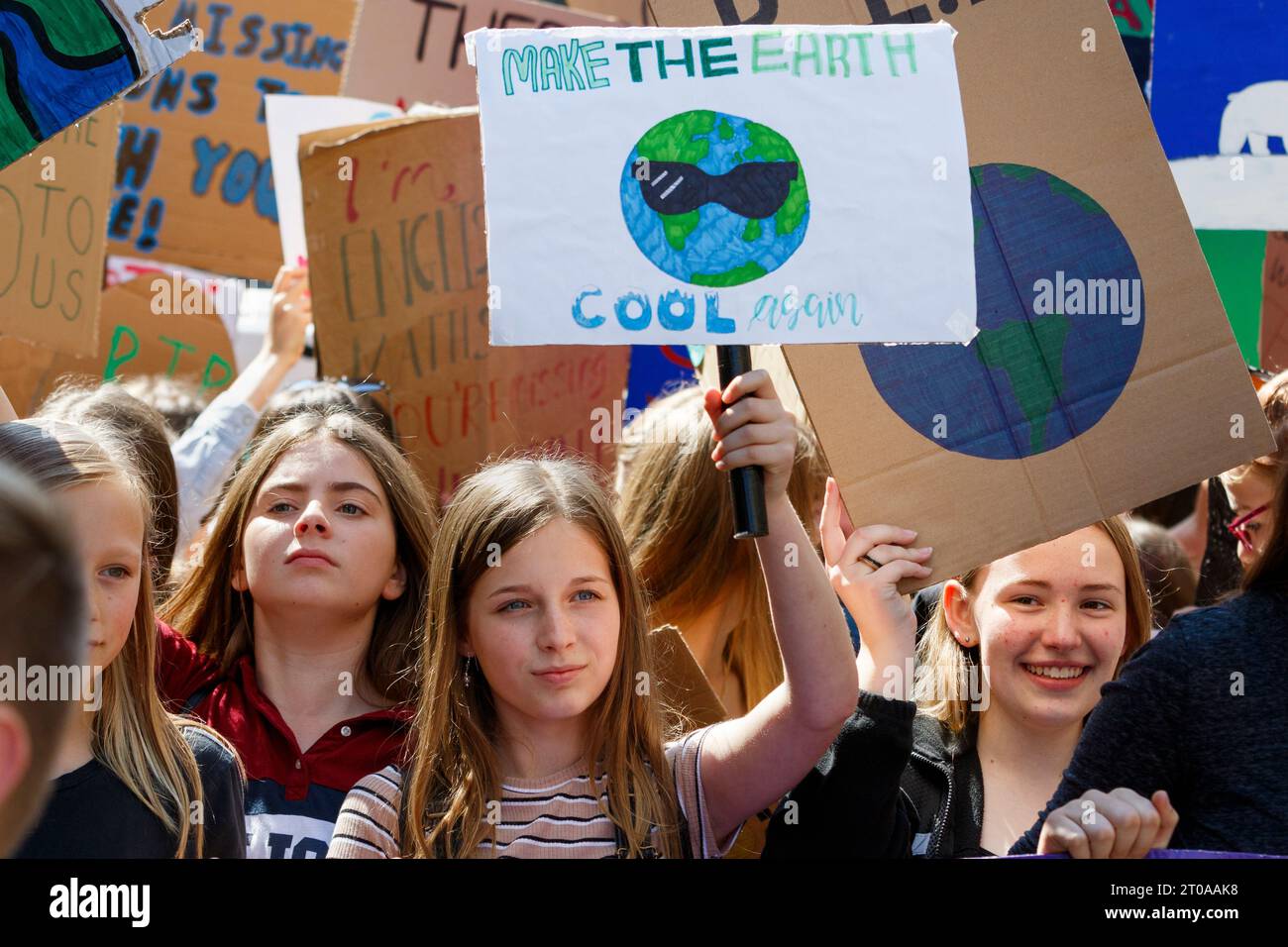 Bath college students and school kids carrying climate change placards ...