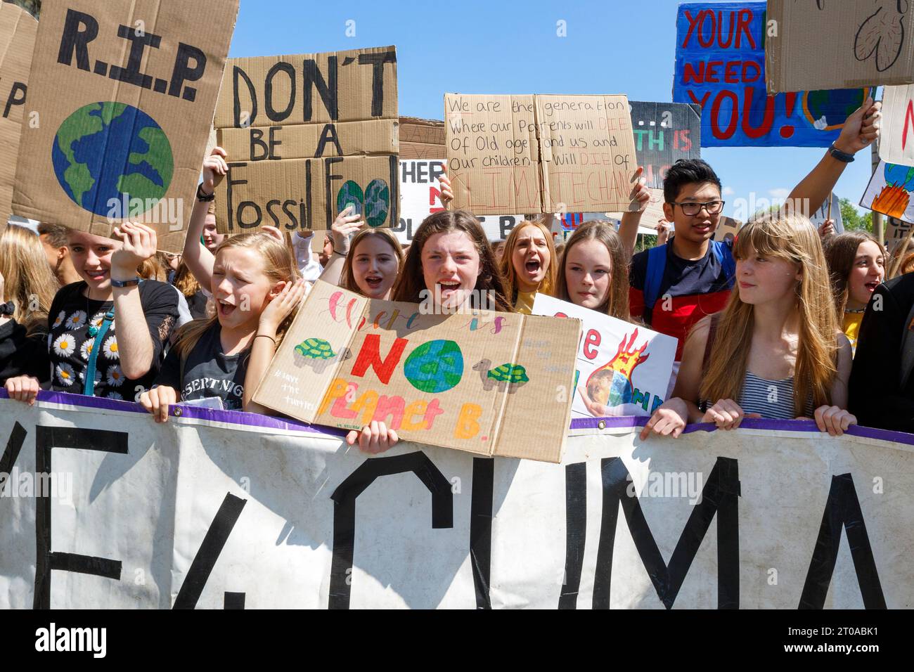 Bath college students and school kids carrying climate change placards ...