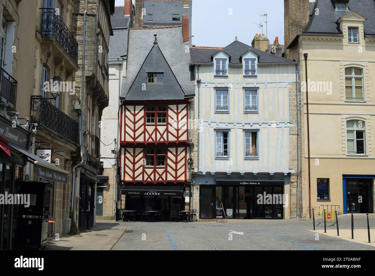 View of restaurants and medieval buildings in Rue Noe, Vannes, Morbihan ...