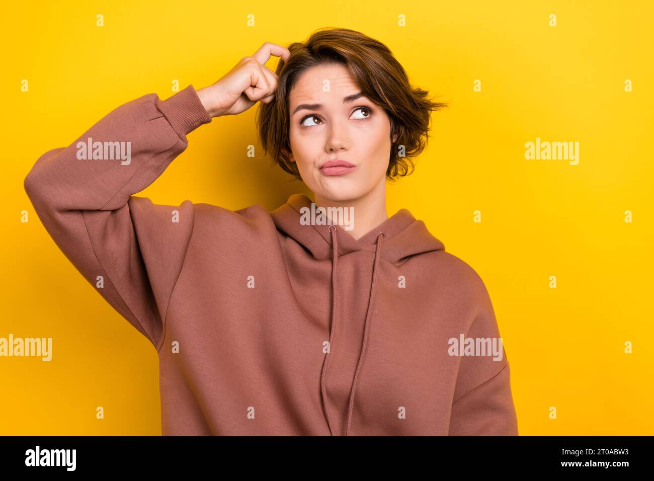 Portrait of ponder pensive girl bob hair dressed brown sportswear ...