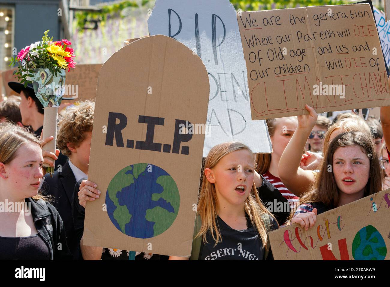Bath college students and school kids carrying climate change placards ...