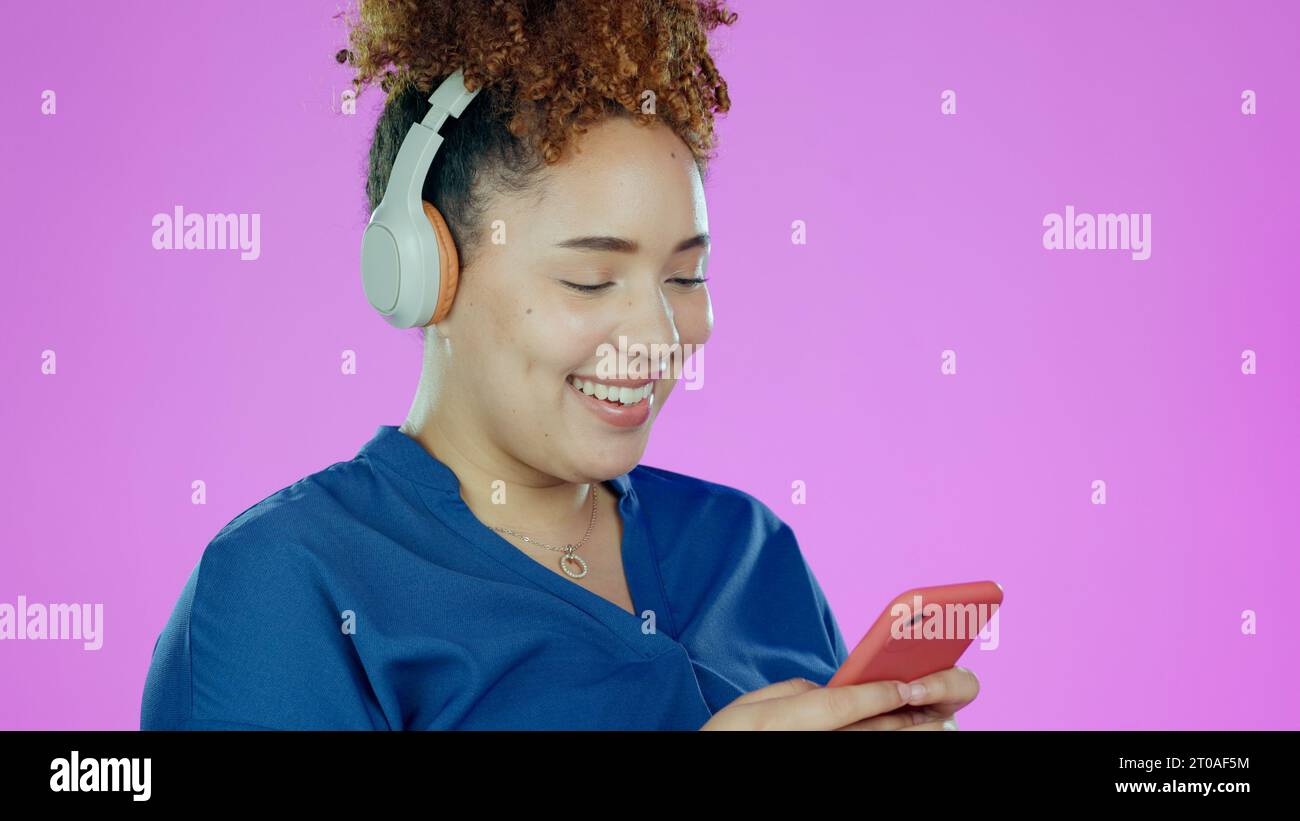 Headphones, music and woman with phone on purple background listening ...