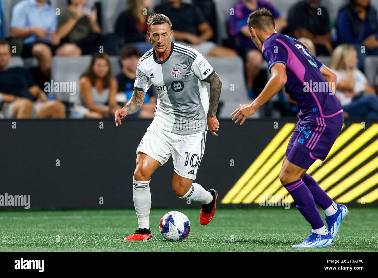 Toronto FC forward Federico Bernardeschi, left, battles Charlotte FC ...