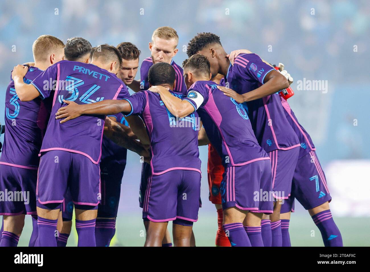 Charlotte FC players huddle before an MLS soccer match against Toronto ...