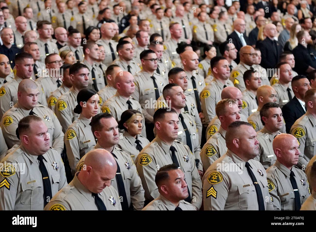 Members of the Los Angels County Sheriff's Dept. attend during the ...