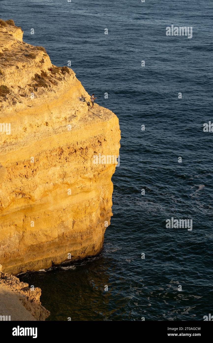 Ocean fishery on the rock Stock Photo - Alamy