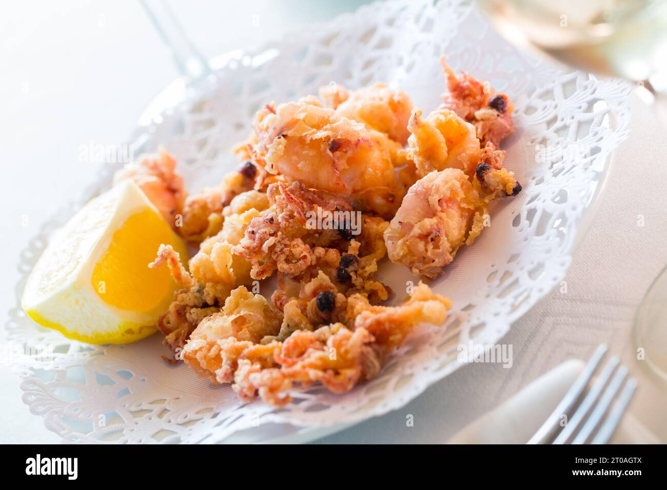 Chipirones, battered fried baby squid Stock Photo - Alamy