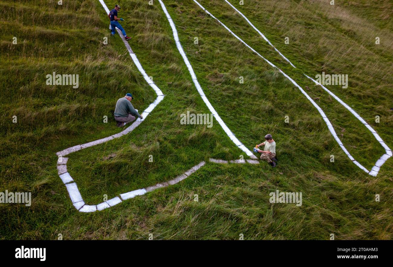 The long Man of Wilmington gets a lick of paint. THe Chaklk figure ...