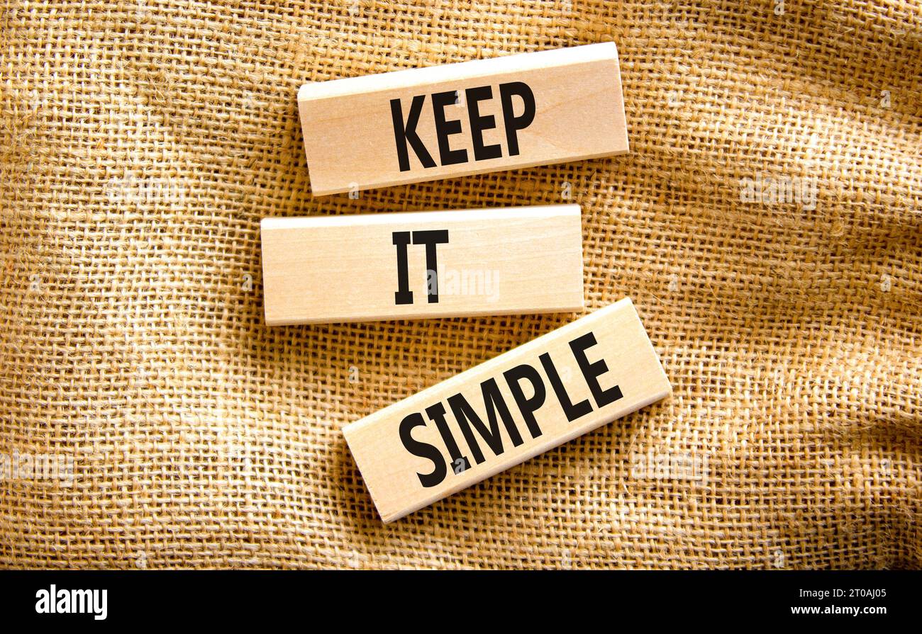 Keep it simple symbol. Concept word Keep it simple on beautiful wooden ...