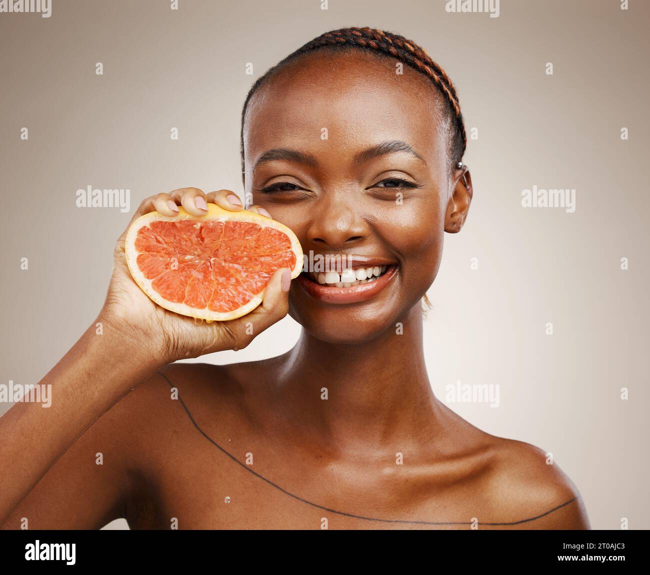 Black woman, skincare and smile with grapefruit, beauty and cosmetics ...
